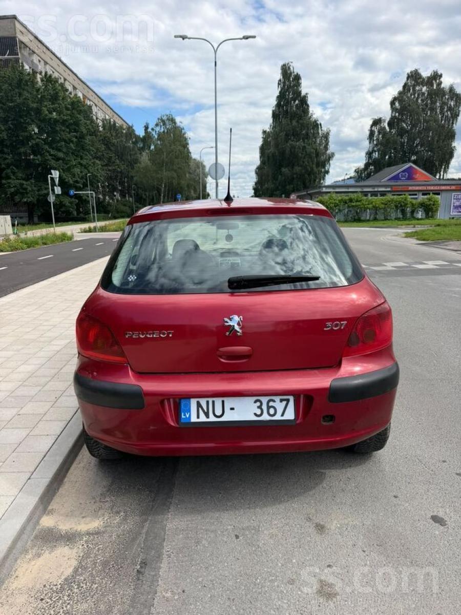 Red Peugeot 307 2003 in Riga, with an engine capacity of 1.40 L and mileage of 195 thousand km for 450 €, photo 4 on AUTOMOTO.COM.LV