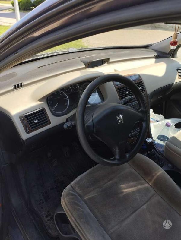 Violet Peugeot 307 2001 in Panevezys, with an engine capacity of 2.00 L and mileage of 326 thousand km for 500 €, photo 6 on AUTOMOTO.COM.LV