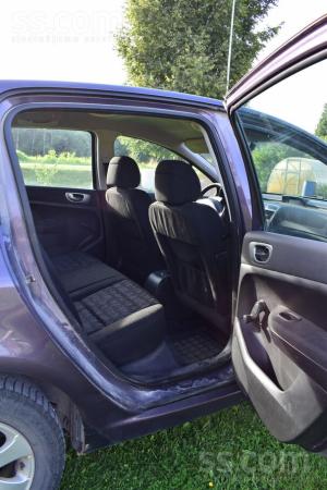 Violet Peugeot 307 2003 in Valmiera, with an engine capacity of 1.60 L and mileage of 340 thousand km for 990 €, photo 9 on AUTOMOTO.COM.LV