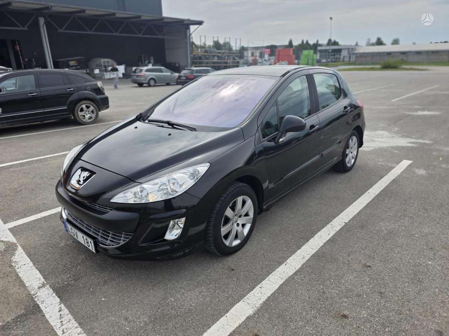 Black Peugeot 308 2009 in Siauliai, with an engine capacity of 2.00 L and mileage of 264 thousand km for 2600 €, photo 1 on AUTOMOTO.COM.LV