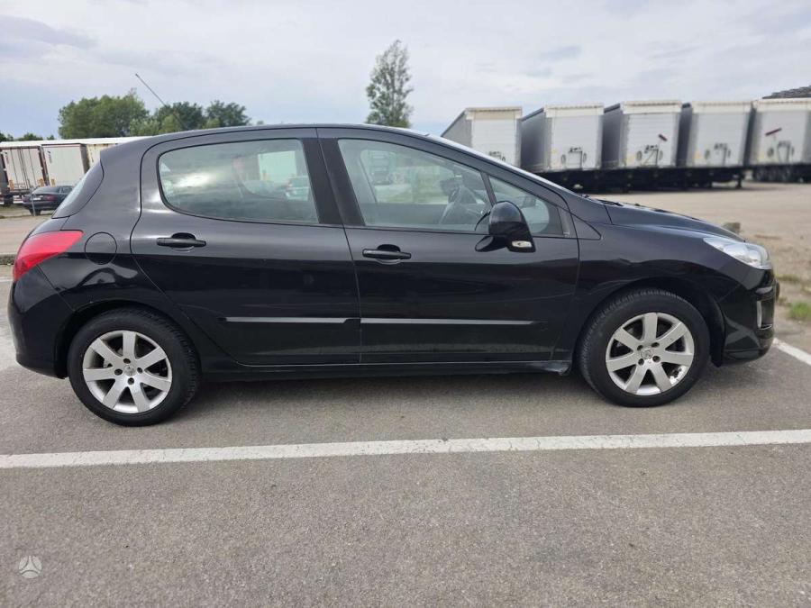 Black Peugeot 308 2009 in Siauliai, with an engine capacity of 2.00 L and mileage of 264 thousand km for 2600 €, photo 6 on AUTOMOTO.COM.LV