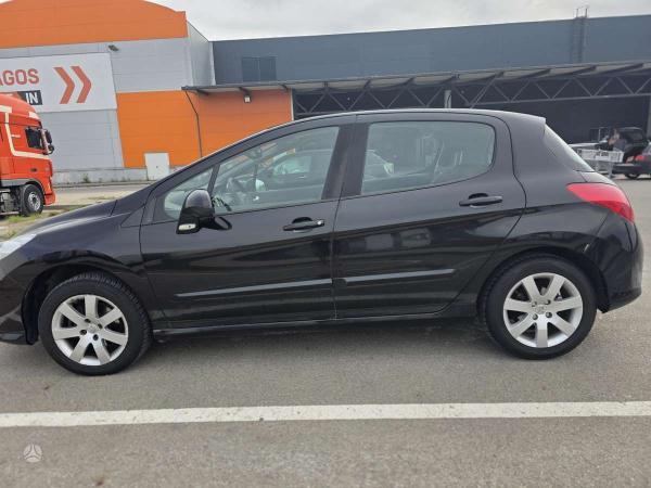 Black Peugeot 308 2009 in Siauliai, with an engine capacity of 2.00 L and mileage of 264 thousand km for 2600 €, photo 9 on AUTOMOTO.COM.LV
