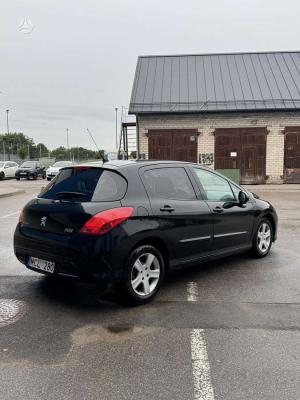 Black Peugeot 308 2010 in Taurage, with an engine capacity of 2.00 L and mileage of 316 thousand km for 1850 €, photo 5 on AUTOMOTO.COM.LV