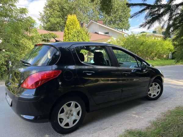 Black Peugeot 308 2011 in Vilnius, with an engine capacity of 1.60 L and mileage of 232 thousand km for 1550 €, photo 2 on AUTOMOTO.COM.LV