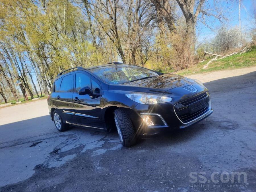 Black Peugeot 308 2013 in Riga, with an engine capacity of 1.60 L and mileage of 174 thousand km for 3350 €, photo 4 on AUTOMOTO.COM.LV