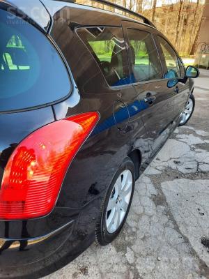 Black Peugeot 308 2013 in Riga, with an engine capacity of 1.60 L and mileage of 174 thousand km for 3350 €, photo 15 on AUTOMOTO.COM.LV