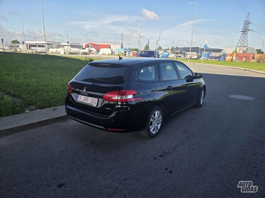 Black Peugeot 308 2014 in Mazeikiai, with an engine capacity of 1.60 L and mileage of 242 thousand km for 3999 €, photo 6 on AUTOMOTO.COM.LV