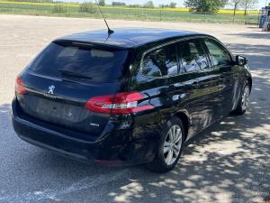 Black Peugeot 308 2015 in Marijampole, with an engine capacity of 1.60 L and mileage of 216 thousand km for 4450 €, photo 7 on AUTOMOTO.COM.LV