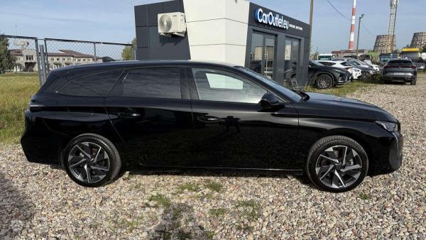 Black Peugeot 308 2023 in Vilnius, with an engine capacity of 1.20 L and mileage of 155 thousand km for 11979 €, photo 8 on AUTOMOTO.COM.LV
