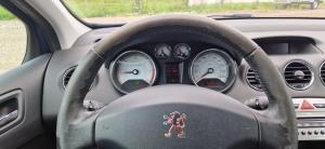 Blue Peugeot 308 2010 in Riga, with an engine capacity of 1.60 L and mileage of 203 thousand km for 4450 €, photo 31 on AUTOMOTO.COM.LV