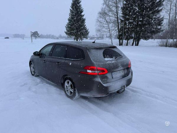 Brown Peugeot 308 2014 in Siauliai, with an engine capacity of 1.20 L and mileage of 21 thousand km for 3600 €, photo 6 on AUTOMOTO.COM.LV
