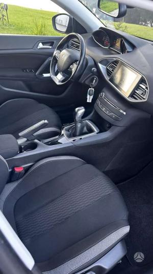 Brown Peugeot 308 2016 in Utena, with an engine capacity of 1.20 L and mileage of 296 thousand km for 3250 €, photo 29 on AUTOMOTO.COM.LV