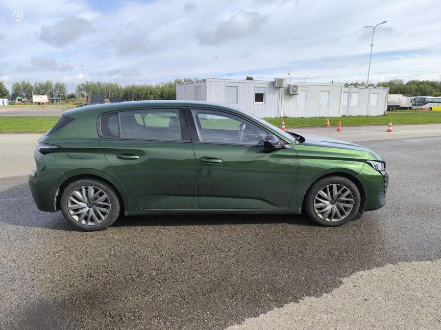 Green Peugeot 308 2022 in Kaunas, with an engine capacity of 1.20 L and mileage of 83 thousand km for 10285 €, photo 5 on AUTOMOTO.COM.LV