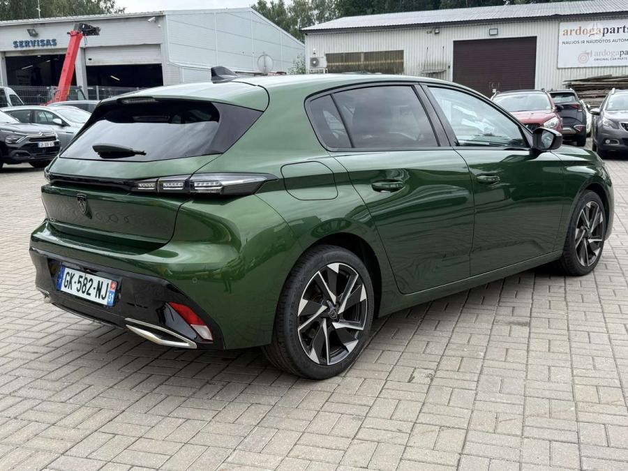 Green Peugeot 308 2022 in Kaunas, with an engine capacity of 1.20 L and mileage of 109 thousand km for 13673 €, photo 4 on AUTOMOTO.COM.LV