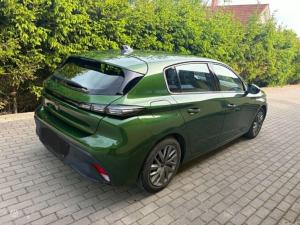 Green Peugeot 308 2022 in Marijampole, with an engine capacity of 1.20 L and mileage of 72 thousand km for 13499 €, photo 4 on AUTOMOTO.COM.LV