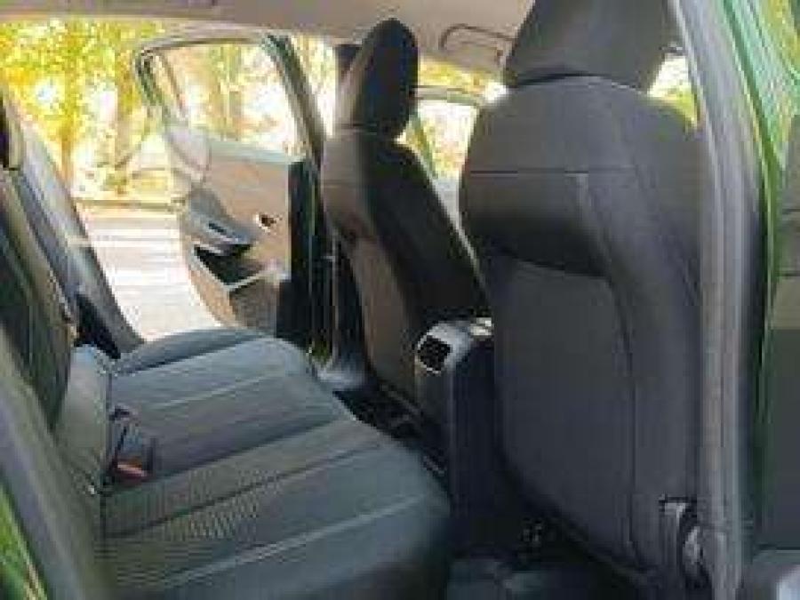 Green Peugeot 308 2022 in Marijampole, with an engine capacity of 1.20 L and mileage of 72 thousand km for 13499 €, photo 7 on AUTOMOTO.COM.LV