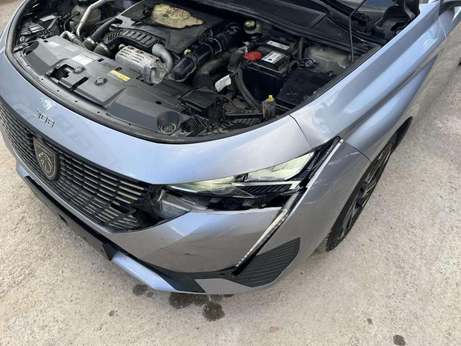 Grey Peugeot 308 2023 in Kaunas, with an engine capacity of 1.20 L and mileage of 74 thousand km for 9900 €, photo 13 on AUTOMOTO.COM.LV