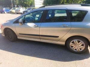 Pelēks Peugeot 308 2009 Panevēža, ar dzinēja tilpumu 1.60 L un nobraukumu 334 tūkst. km par 1150 €, foto 9 vietnē AUTOMOTO.COM.LV