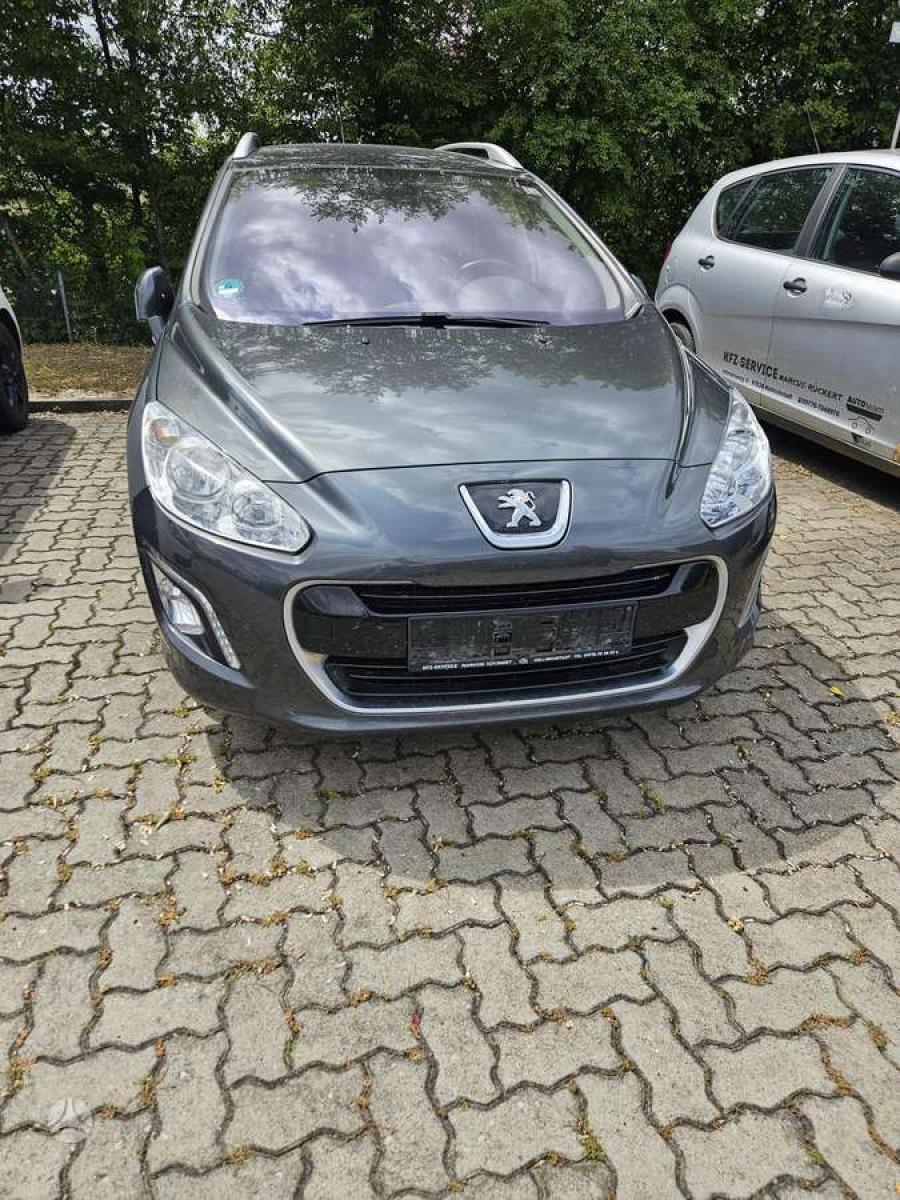 Grey Peugeot 308 2012 in Utena, with an engine capacity of 1.56 L and mileage of 165 thousand km for 2299 €, photo 1 on AUTOMOTO.COM.LV
