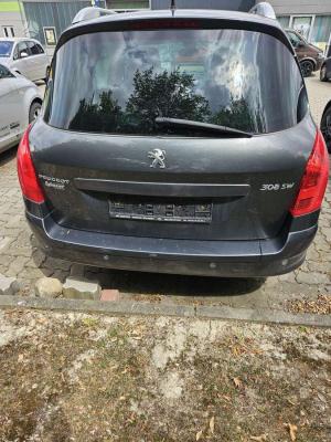 Grey Peugeot 308 2012 in Utena, with an engine capacity of 1.56 L and mileage of 165 thousand km for 2299 €, photo 3 on AUTOMOTO.COM.LV