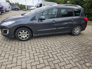 Grey Peugeot 308 2012 in Utena, with an engine capacity of 1.56 L and mileage of 165 thousand km for 2299 €, photo 11 on AUTOMOTO.COM.LV
