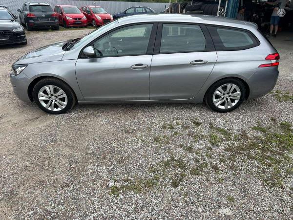 Grey Peugeot 308 2015 in Jurbarkas, with an engine capacity of 1.20 L and mileage of 170 thousand km for 3998 €, photo 4 on AUTOMOTO.COM.LV