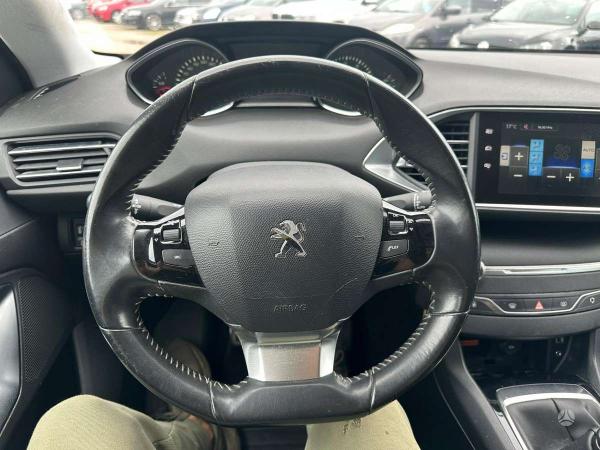 Grey Peugeot 308 2015 in Jurbarkas, with an engine capacity of 1.20 L and mileage of 170 thousand km for 3998 €, photo 10 on AUTOMOTO.COM.LV