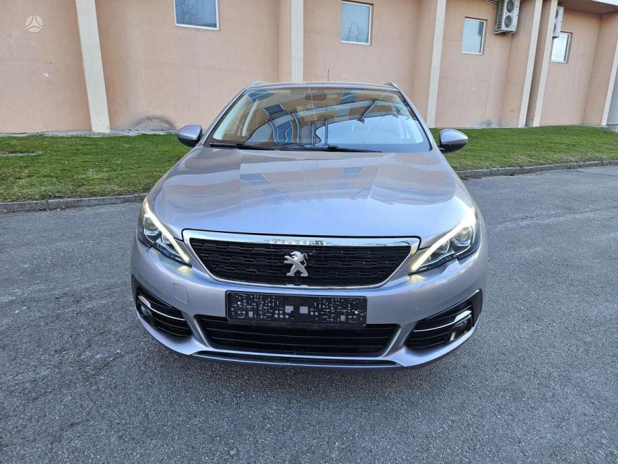 Grey Peugeot 308 2019 in Siauliai, with an engine capacity of 1.20 L and mileage of 112 thousand km for 5799 €, photo 5 on AUTOMOTO.COM.LV