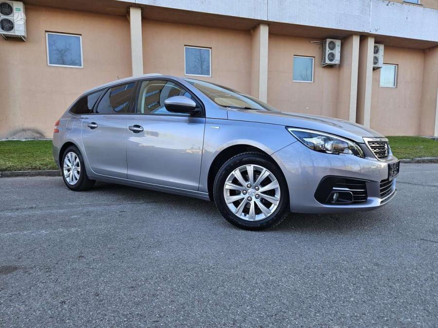Grey Peugeot 308 2019 in Siauliai, with an engine capacity of 1.20 L and mileage of 112 thousand km for 5799 €, photo 8 on AUTOMOTO.COM.LV