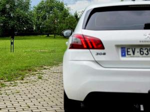 White Peugeot 308 2018 in Klaipeda, with an engine capacity of 1.56 L and mileage of 185 thousand km for 4990 €, photo 13 on AUTOMOTO.COM.LV