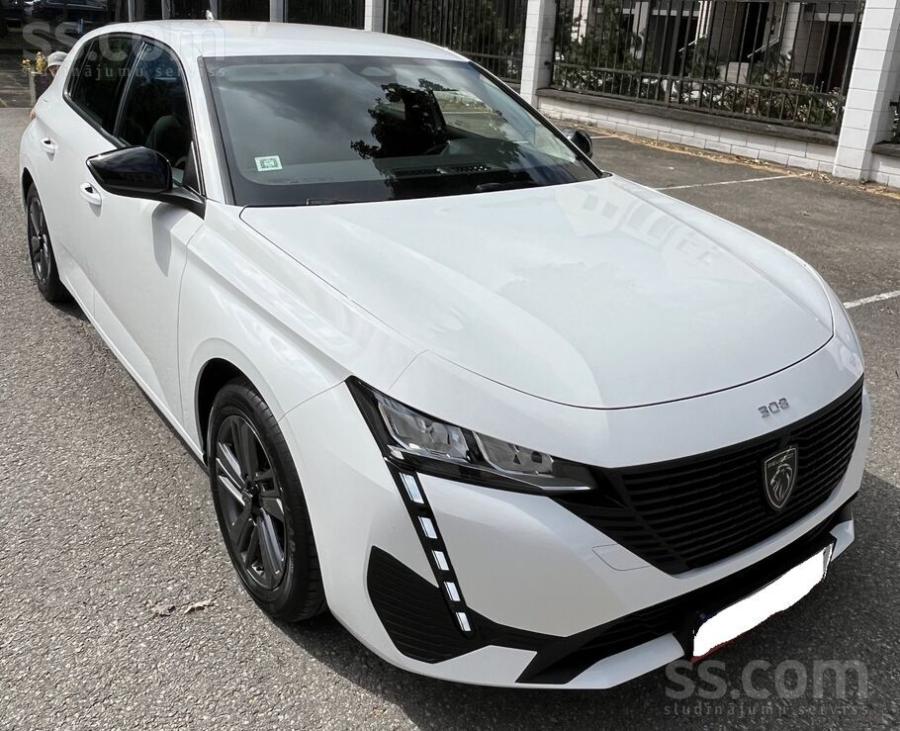 White Peugeot 308 2022 in Riga, with an engine capacity of 1.20 L and mileage of 71 thousand km for 14900 €, photo 1 on AUTOMOTO.COM.LV