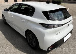 White Peugeot 308 2022 in Riga, with an engine capacity of 1.20 L and mileage of 71 thousand km for 14900 €, photo 4 on AUTOMOTO.COM.LV