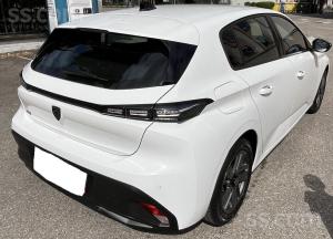 White Peugeot 308 2022 in Riga, with an engine capacity of 1.20 L and mileage of 71 thousand km for 14900 €, photo 5 on AUTOMOTO.COM.LV