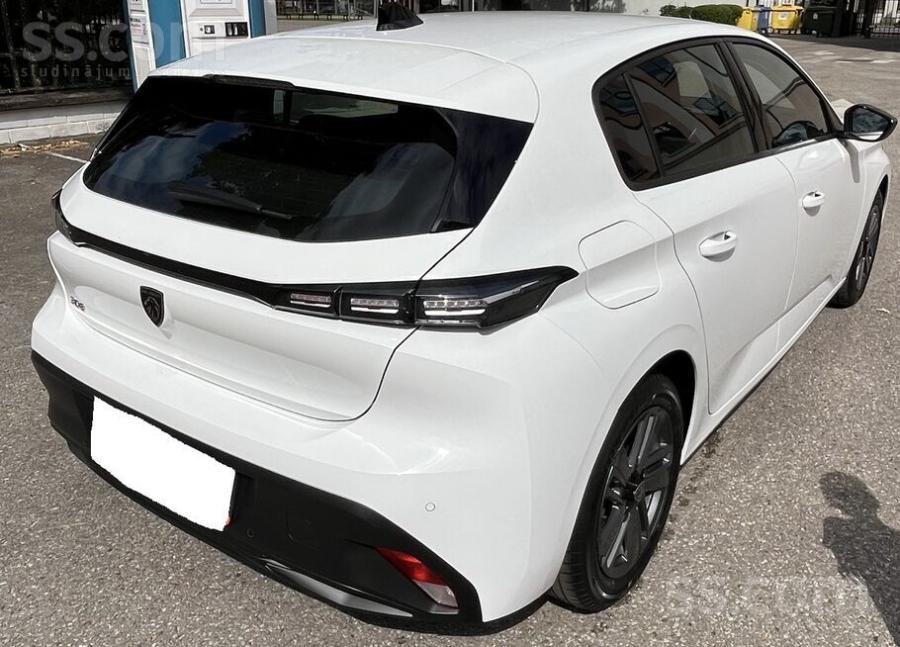 White Peugeot 308 2022 in Riga, with an engine capacity of 1.20 L and mileage of 71 thousand km for 14900 €, photo 5 on AUTOMOTO.COM.LV
