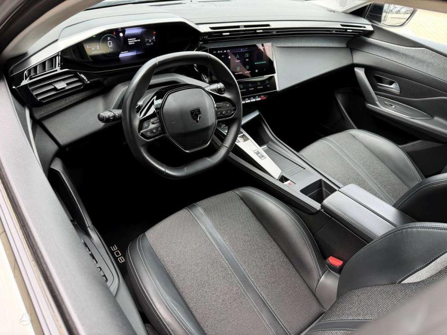 White Peugeot 308 2022 in Kaunas, with an engine capacity of 1.20 L and mileage of 180 thousand km for 12900 €, photo 8 on AUTOMOTO.COM.LV