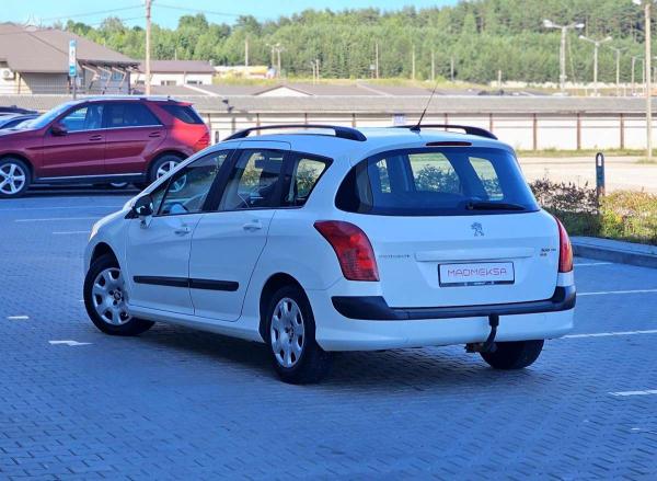 White Peugeot 308 2012 in Vilnius, with an engine capacity of 1.56 L and mileage of 236 thousand km for 2850 €, photo 6 on AUTOMOTO.COM.LV