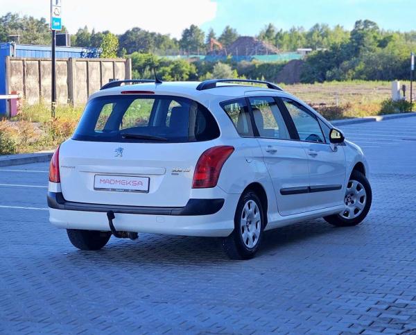 White Peugeot 308 2012 in Vilnius, with an engine capacity of 1.56 L and mileage of 236 thousand km for 2850 €, photo 9 on AUTOMOTO.COM.LV