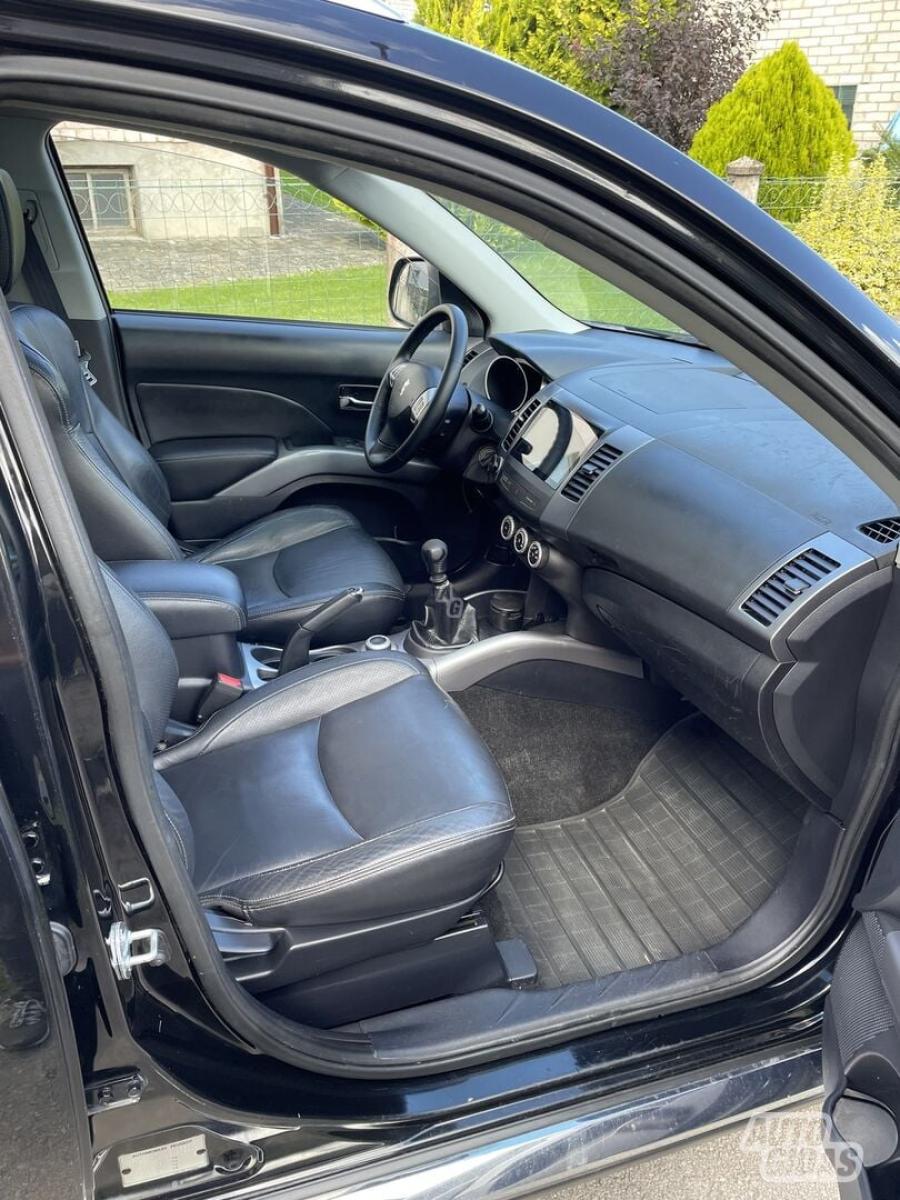 Melns Peugeot 4007 2008 Raseiniai, ar dzinēja tilpumu 2.20 L un nobraukumu 208 tūkst. km par 3700 €, foto 10 vietnē AUTOMOTO.COM.LV