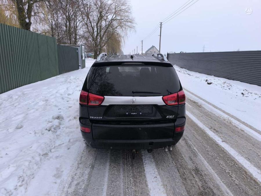 Black Peugeot 4007 2009 in Marijampole, with an engine capacity of 2.18 L and mileage of 309 thousand km for 3550 €, photo 4 on AUTOMOTO.COM.LV