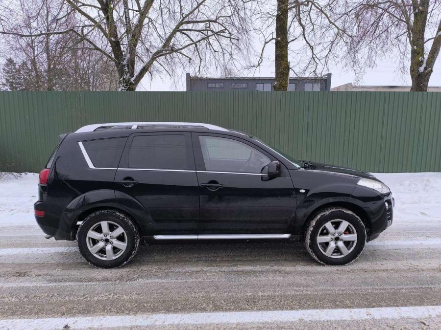Black Peugeot 4007 2009 in Marijampole, with an engine capacity of 2.18 L and mileage of 309 thousand km for 3550 €, photo 6 on AUTOMOTO.COM.LV
