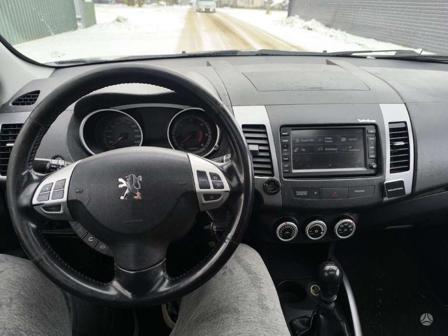 Black Peugeot 4007 2009 in Marijampole, with an engine capacity of 2.18 L and mileage of 309 thousand km for 3550 €, photo 14 on AUTOMOTO.COM.LV