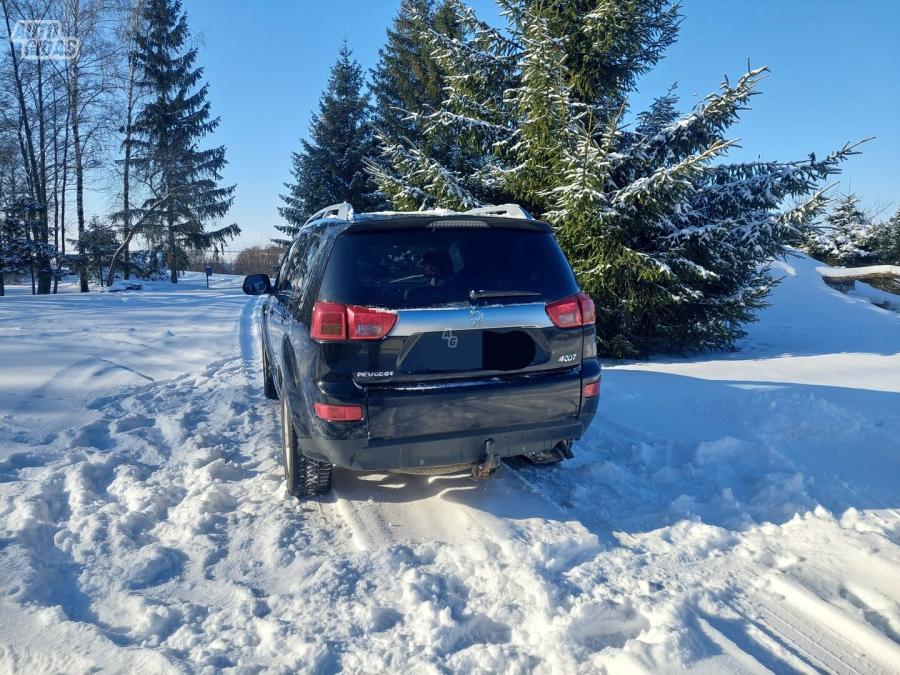 Black Peugeot 4007 2009 in Vilkaviskis, with an engine capacity of 2.20 L and mileage of 263 thousand km for 3700 €, photo 2 on AUTOMOTO.COM.LV