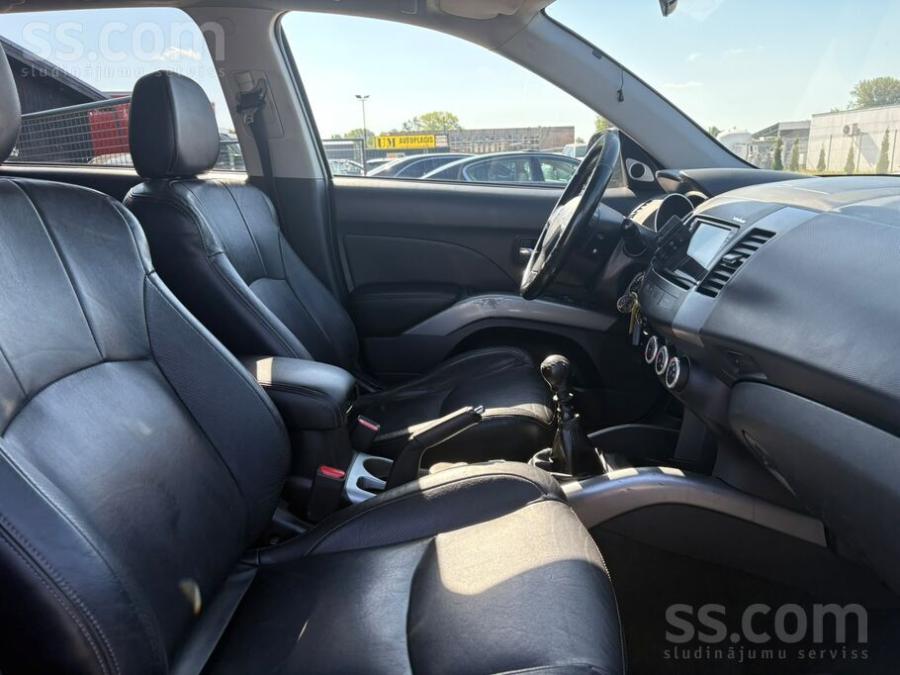 Black Peugeot 4007 2009 in Liepaja, with an engine capacity of 2.20 L and mileage of 347 thousand km for 2850 €, photo 20 on AUTOMOTO.COM.LV