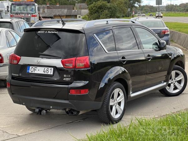 Black Peugeot 4007 2010 in Jekabpils, with an engine capacity of 2.20 L and mileage of 281 thousand km for 6490 €, photo 2 on AUTOMOTO.COM.LV