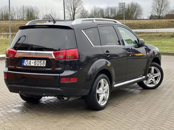 Black Peugeot 4007 2010 in Jekabpils, with an engine capacity of 2.20 L and mileage of 252 thousand km for 6800 €, photo 2 on AUTOMOTO.COM.LV