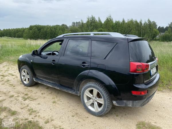 Melns Peugeot 4007 2011 Viļņa, ar dzinēja tilpumu 2.20 L un nobraukumu 297 tūkst. km par 2000 €, foto 2 vietnē AUTOMOTO.COM.LV