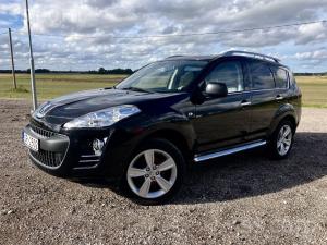 Black Peugeot 4007 2011 in Talsi, with an engine capacity of 2.20 L and mileage of 216 thousand km for 7999 €, photo 8 on AUTOMOTO.COM.LV