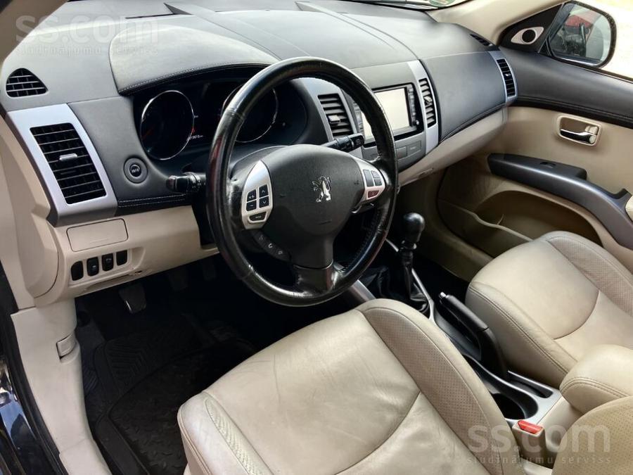 Black Peugeot 4007 2011 in Talsi, with an engine capacity of 2.20 L and mileage of 216 thousand km for 7999 €, photo 15 on AUTOMOTO.COM.LV