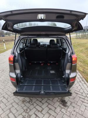 Brown Peugeot 4007 2013 in Riga, with an engine capacity of 2.20 L and mileage of 239 thousand km for 5900 €, photo 14 on AUTOMOTO.COM.LV
