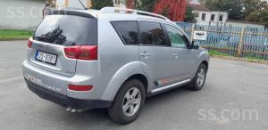 Grey Peugeot 4007 2009 in Riga, with an engine capacity of 2.20 L and mileage of 327 thousand km for 2650 €, photo 4 on AUTOMOTO.COM.LV